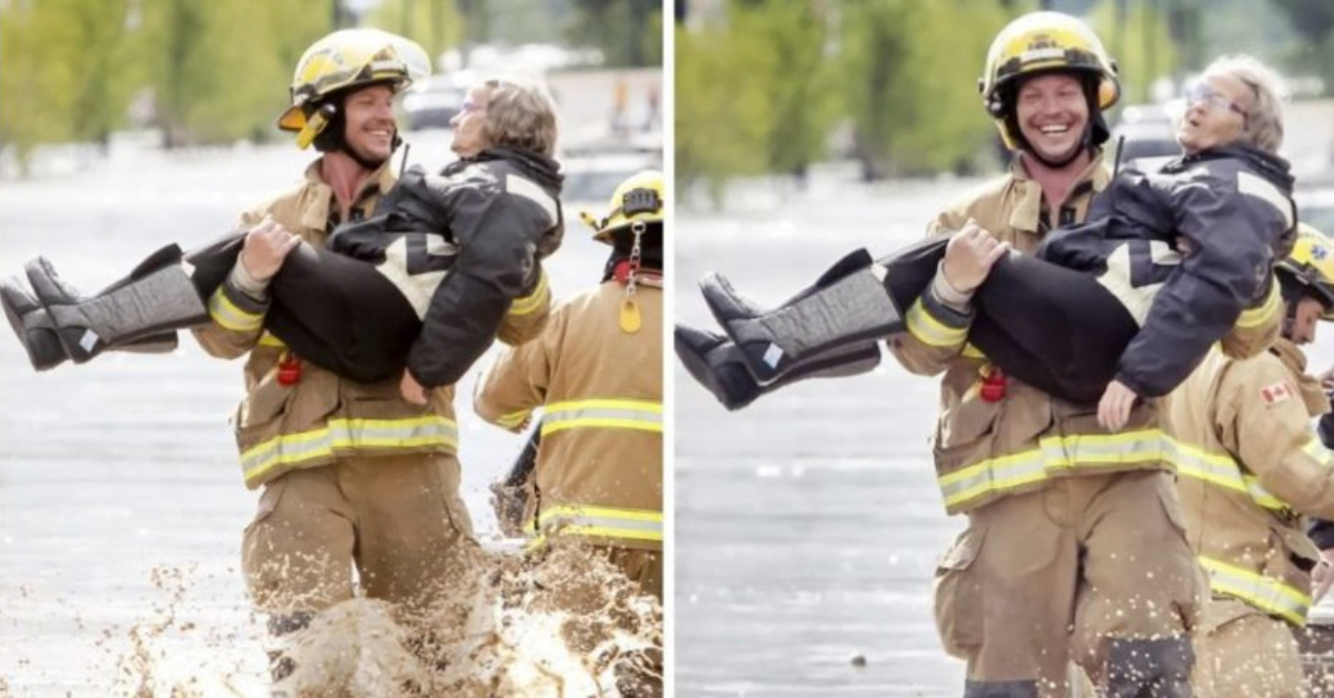 Firefighter Saves Old Woman from Flooding; Picture Goes Viral on the ...