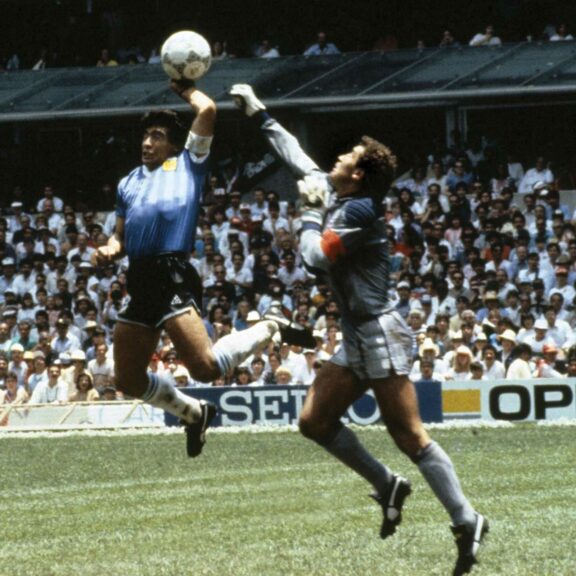 Diego Maradona scores the infamous Hand of God goal, 1986 - Lively ...